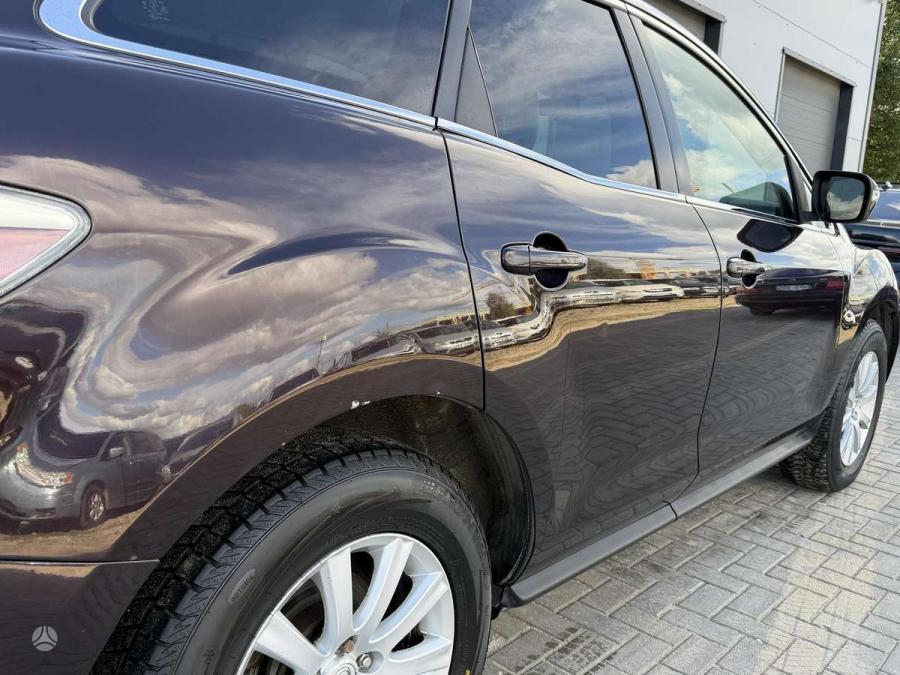 Violet Mazda CX-7 2010 in Vilnius, with an engine capacity of 2.50 L and mileage of 225 thousand km for 2850 €, photo 7 on AUTOMOTO.COM.LV