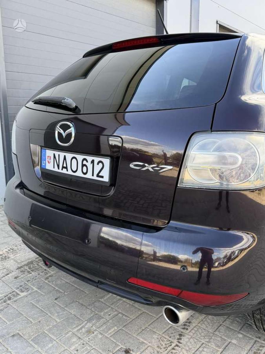 Violet Mazda CX-7 2010 in Vilnius, with an engine capacity of 2.50 L and mileage of 225 thousand km for 2850 €, photo 8 on AUTOMOTO.COM.LV