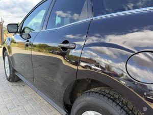 Violet Mazda CX-7 2010 in Vilnius, with an engine capacity of 2.50 L and mileage of 225 thousand km for 2850 €, photo 12 on AUTOMOTO.COM.LV