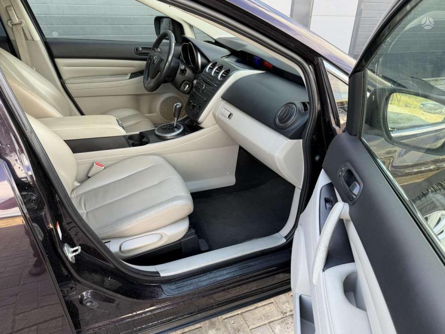 Violet Mazda CX-7 2010 in Vilnius, with an engine capacity of 2.50 L and mileage of 225 thousand km for 2850 €, photo 13 on AUTOMOTO.COM.LV