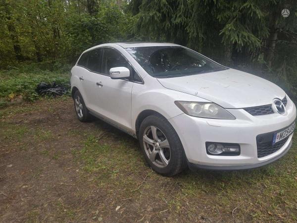 White Mazda CX-7 2007 in Vilnius, with an engine capacity of 2.30 L and mileage of 270 thousand km for 3000 €, photo 1 on AUTOMOTO.COM.LV