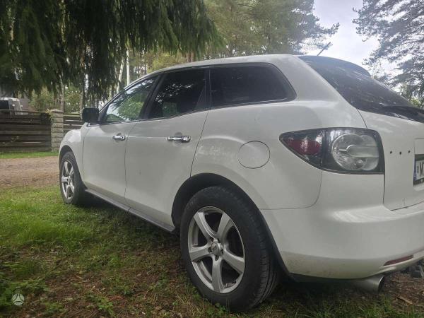 White Mazda CX-7 2007 in Vilnius, with an engine capacity of 2.30 L and mileage of 270 thousand km for 3000 €, photo 6 on AUTOMOTO.COM.LV