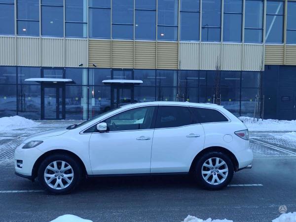 White Mazda CX-7 2008 in Vilnius, with an engine capacity of 2.26 L and mileage of 245 thousand km for 1900 €, photo 3 on AUTOMOTO.COM.LV