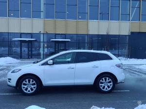 White Mazda CX-7 2008 in Vilnius, with an engine capacity of 2.26 L and mileage of 245 thousand km for 1900 €, photo 3 on AUTOMOTO.COM.LV