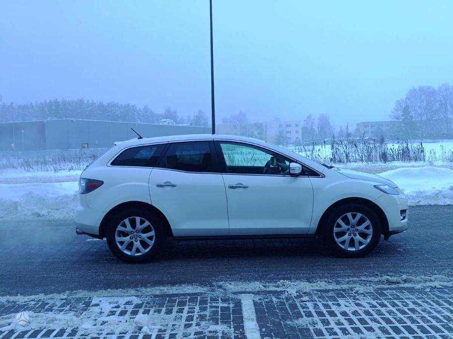 White Mazda CX-7 2008 in Vilnius, with an engine capacity of 2.26 L and mileage of 190 thousand km for 1900 €, photo 4 on AUTOMOTO.COM.LV