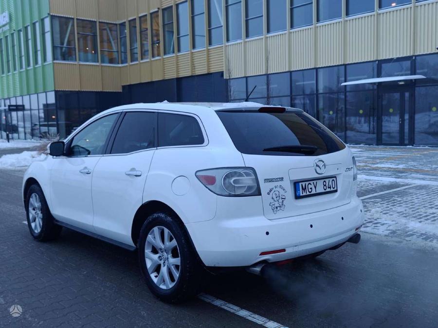 White Mazda CX-7 2008 in Vilnius, with an engine capacity of 2.26 L and mileage of 190 thousand km for 1900 €, photo 6 on AUTOMOTO.COM.LV
