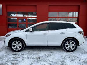 White Mazda CX-7 2010 in Marijampole, with an engine capacity of 2.18 L and mileage of 217 thousand km for 5450 €, photo 4 on AUTOMOTO.COM.LV