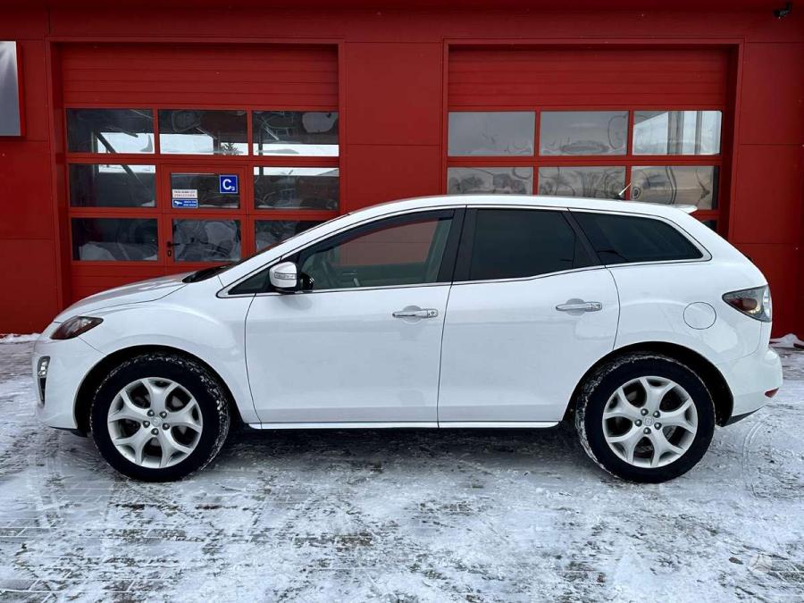 White Mazda CX-7 2010 in Marijampole, with an engine capacity of 2.18 L and mileage of 217 thousand km for 5450 €, photo 4 on AUTOMOTO.COM.LV