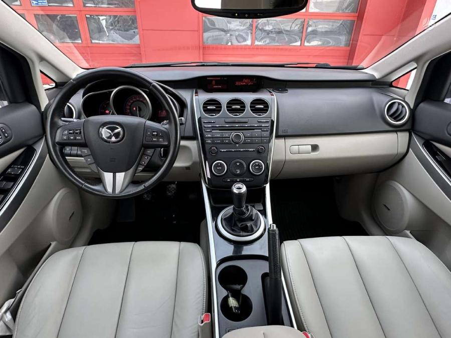 White Mazda CX-7 2010 in Marijampole, with an engine capacity of 2.18 L and mileage of 217 thousand km for 5450 €, photo 14 on AUTOMOTO.COM.LV