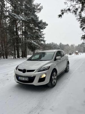 Balts Mazda CX-7 2010 Radviliškis, ar dzinēja tilpumu 2.18 L un nobraukumu 201 tūkst. km par 5100 €, foto  vietnē AUTOMOTO.COM.LV
