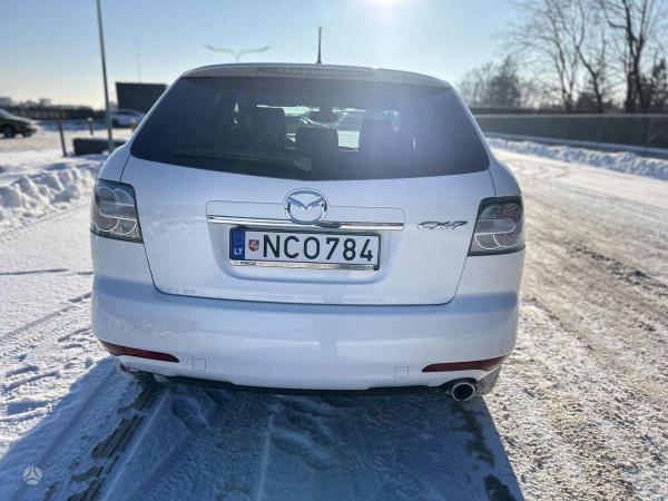 White Mazda CX-7 2010 in Vilnius, with an engine capacity of 2.43 L and mileage of 182 thousand km for 4800 €, photo 5 on AUTOMOTO.COM.LV
