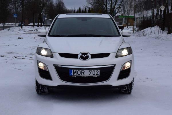 White Mazda CX-7 2010 in Vilnius, with an engine capacity of 2.18 L and mileage of 250 thousand km for 5650 €, photo 2 on AUTOMOTO.COM.LV