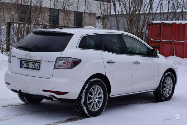 White Mazda CX-7 2010 in Vilnius, with an engine capacity of 2.18 L and mileage of 250 thousand km for 5650 €, photo 5 on AUTOMOTO.COM.LV