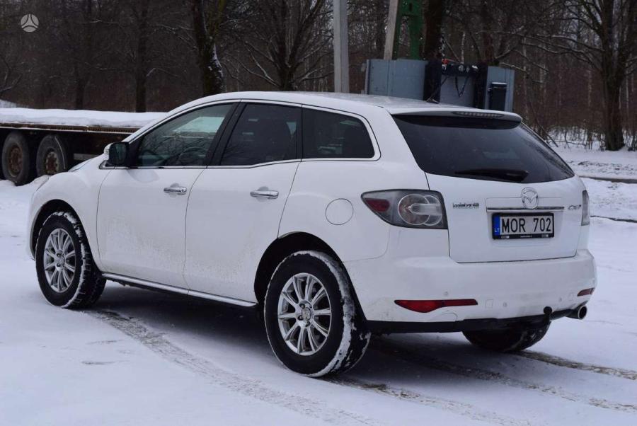 White Mazda CX-7 2010 in Vilnius, with an engine capacity of 2.18 L and mileage of 250 thousand km for 5650 €, photo 7 on AUTOMOTO.COM.LV