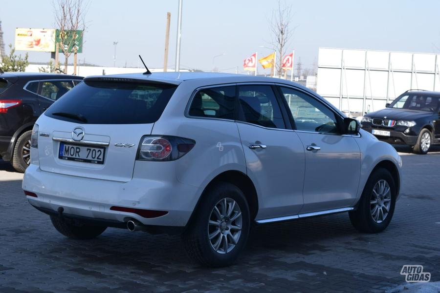 White Mazda CX-7 2010 in Vilnius, with an engine capacity of 2.20 L and mileage of 237 thousand km for 5650 €, photo 5 on AUTOMOTO.COM.LV