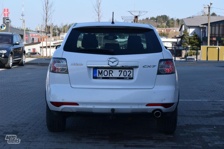 White Mazda CX-7 2010 in Vilnius, with an engine capacity of 2.20 L and mileage of 237 thousand km for 5650 €, photo 6 on AUTOMOTO.COM.LV