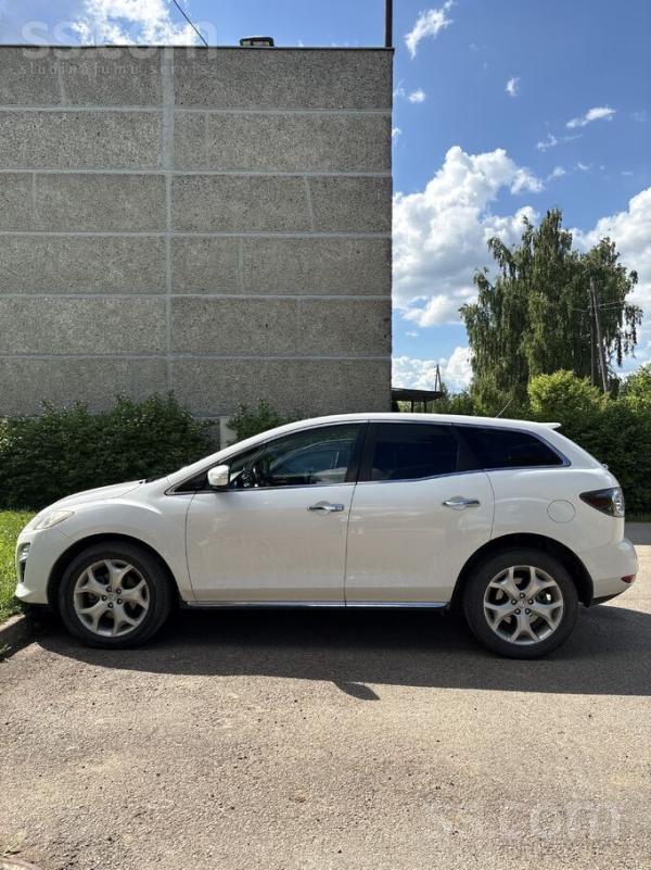 White Mazda CX-7 2010 in Daugavpils, with an engine capacity of 2.20 L and mileage of 196 thousand km for 5200 €, photo 2 on AUTOMOTO.COM.LV