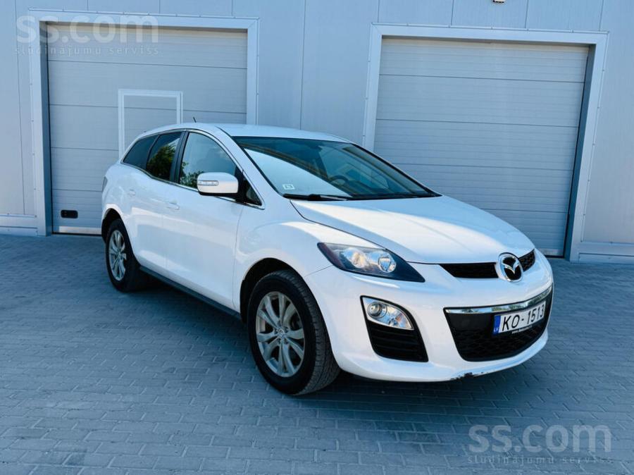 White Mazda CX-7 2010 in Riga, with an engine capacity of 2.00 L and mileage of 247 thousand km for 3400 €, photo 4 on AUTOMOTO.COM.LV