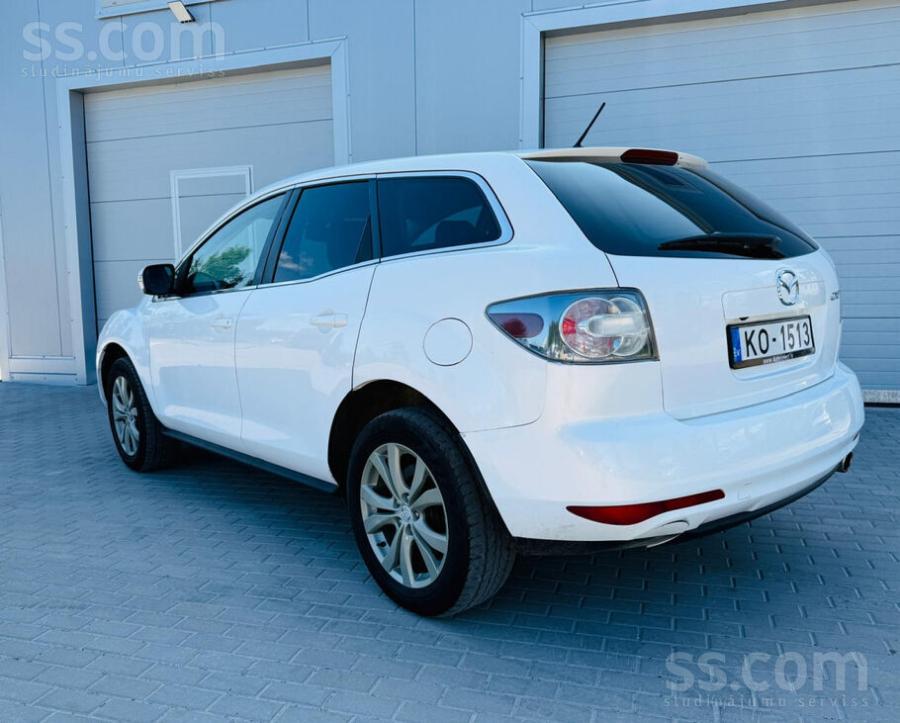 White Mazda CX-7 2010 in Riga, with an engine capacity of 2.00 L and mileage of 247 thousand km for 3400 €, photo 5 on AUTOMOTO.COM.LV