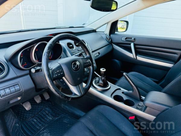 Белый Мазда СХ-7 2010 в Рига, объемом двигателя 2.00 л и пробегом 247 тыс. км за 3400 €, фото 7 на AUTOMOTO.COM.LV