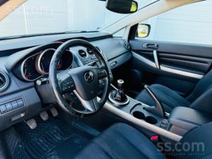 White Mazda CX-7 2010 in Riga, with an engine capacity of 2.00 L and mileage of 247 thousand km for 3400 €, photo 8 on AUTOMOTO.COM.LV