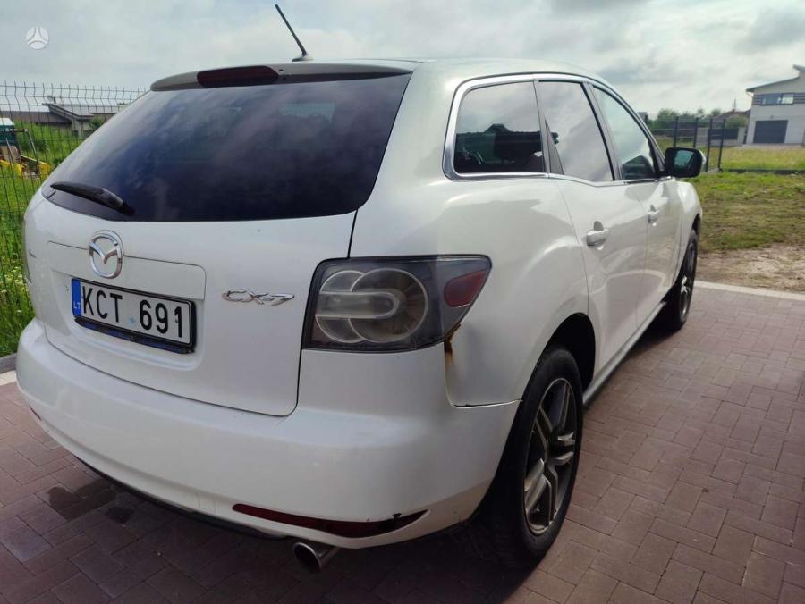 Balts Mazda CX-7 2010 Panevēža, ar dzinēja tilpumu 2.18 L un nobraukumu 300 tūkst. km par 1550 €, foto 5 vietnē AUTOMOTO.COM.LV