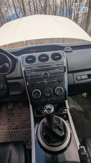 White Mazda CX-7 2011 in Marijampole, with an engine capacity of 2.20 L and mileage of 299 thousand km for 3400 €, photo 7 on AUTOMOTO.COM.LV