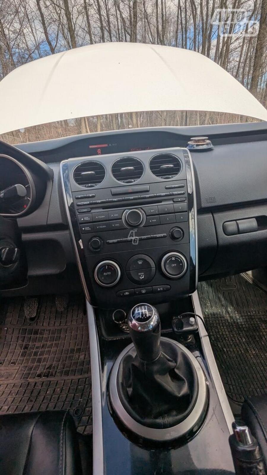 White Mazda CX-7 2011 in Marijampole, with an engine capacity of 2.20 L and mileage of 299 thousand km for 3400 €, photo 7 on AUTOMOTO.COM.LV