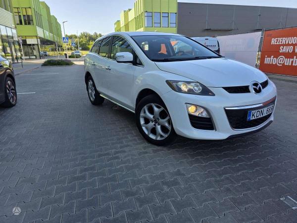 White Mazda CX-7 2011 in Kaunas, with an engine capacity of 2.18 L and mileage of 300 thousand km for 2900 €, photo 1 on AUTOMOTO.COM.LV