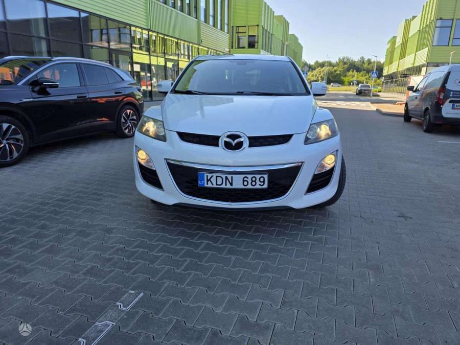 White Mazda CX-7 2011 in Kaunas, with an engine capacity of 2.18 L and mileage of 300 thousand km for 2900 €, photo 3 on AUTOMOTO.COM.LV