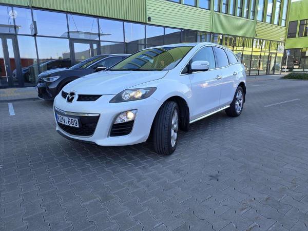 White Mazda CX-7 2011 in Kaunas, with an engine capacity of 2.18 L and mileage of 300 thousand km for 2900 €, photo 3 on AUTOMOTO.COM.LV