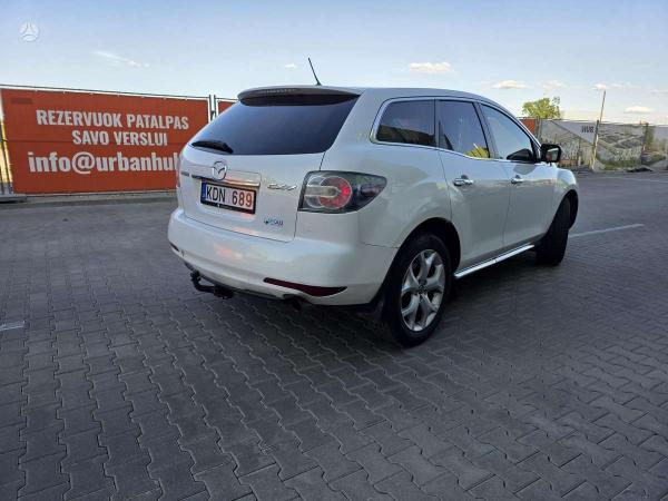 White Mazda CX-7 2011 in Kaunas, with an engine capacity of 2.18 L and mileage of 300 thousand km for 2900 €, photo 4 on AUTOMOTO.COM.LV