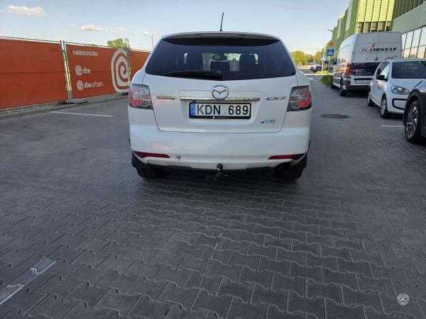 White Mazda CX-7 2011 in Kaunas, with an engine capacity of 2.18 L and mileage of 300 thousand km for 2900 €, photo 5 on AUTOMOTO.COM.LV