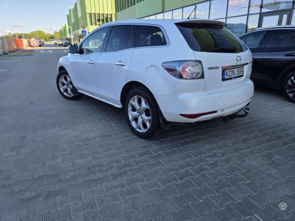 White Mazda CX-7 2011 in Kaunas, with an engine capacity of 2.18 L and mileage of 300 thousand km for 2900 €, photo 6 on AUTOMOTO.COM.LV