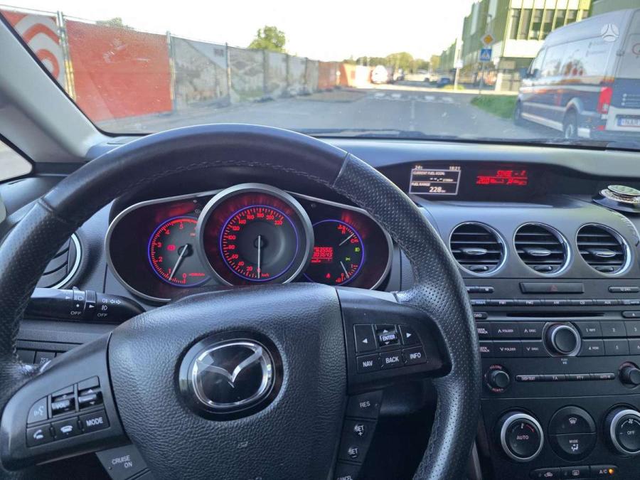 White Mazda CX-7 2011 in Kaunas, with an engine capacity of 2.18 L and mileage of 300 thousand km for 2900 €, photo 9 on AUTOMOTO.COM.LV