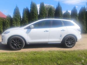 White Mazda CX-7 2011 in Kretinga, with an engine capacity of 2.18 L and mileage of 273 thousand km for 4300 €, photo 3 on AUTOMOTO.COM.LV