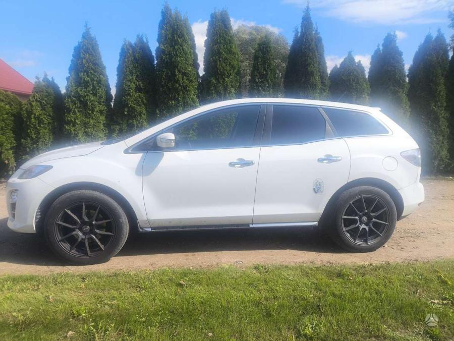 White Mazda CX-7 2011 in Kretinga, with an engine capacity of 2.18 L and mileage of 273 thousand km for 4300 €, photo 3 on AUTOMOTO.COM.LV