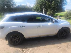 White Mazda CX-7 2011 in Kretinga, with an engine capacity of 2.18 L and mileage of 273 thousand km for 4300 €, photo 5 on AUTOMOTO.COM.LV