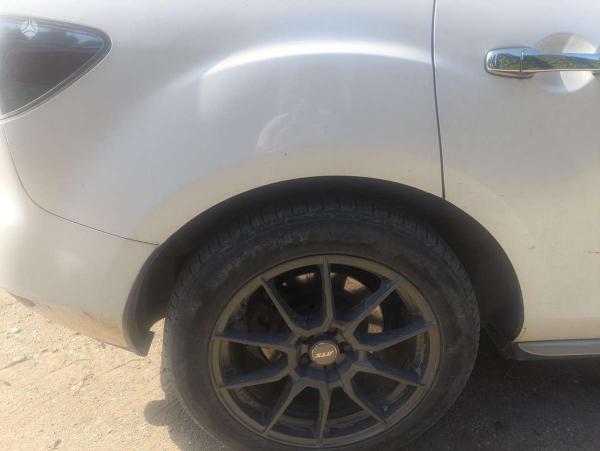 White Mazda CX-7 2011 in Kretinga, with an engine capacity of 2.18 L and mileage of 273 thousand km for 4300 €, photo 6 on AUTOMOTO.COM.LV