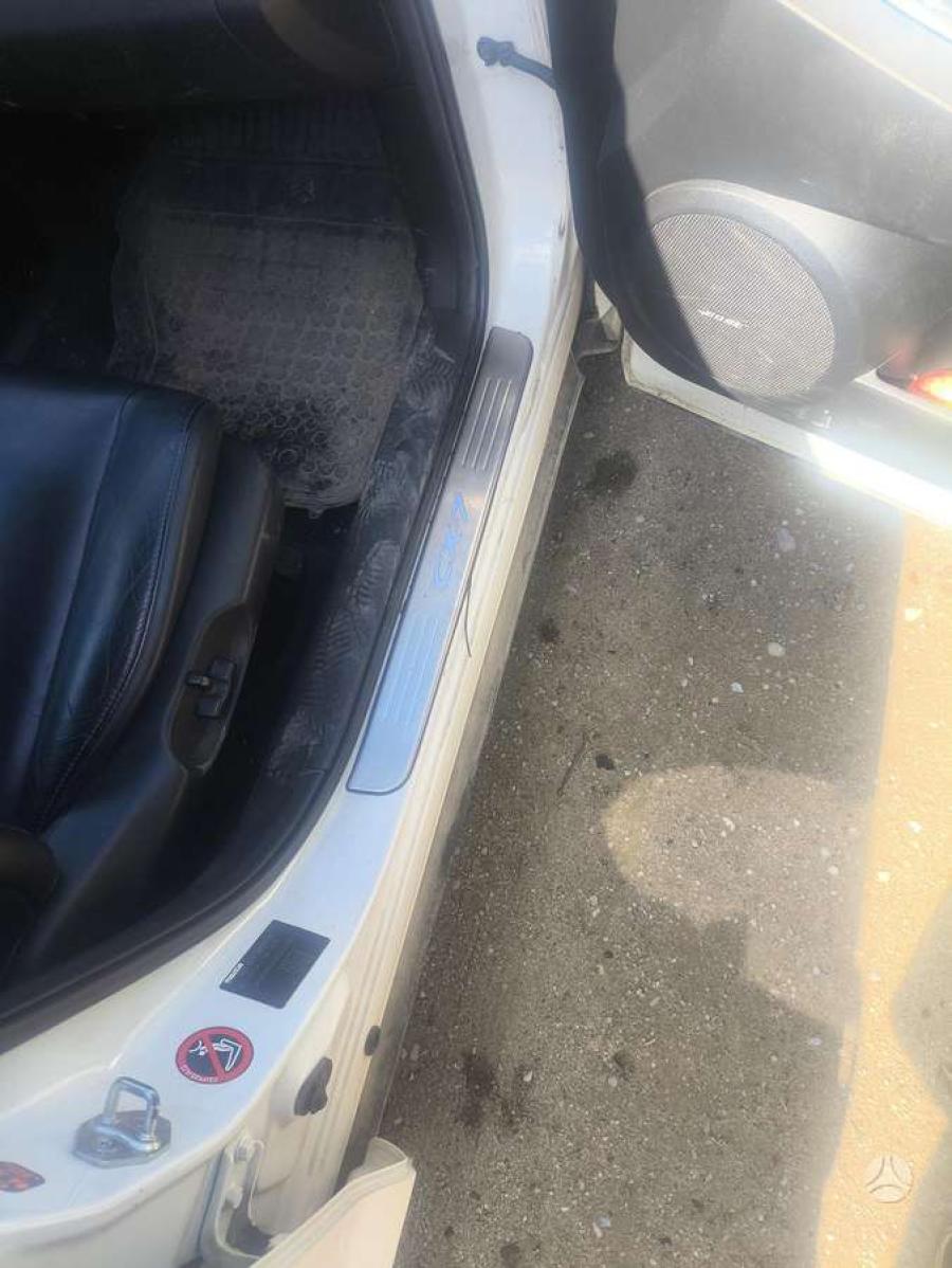 White Mazda CX-7 2011 in Kretinga, with an engine capacity of 2.18 L and mileage of 273 thousand km for 4300 €, photo 13 on AUTOMOTO.COM.LV