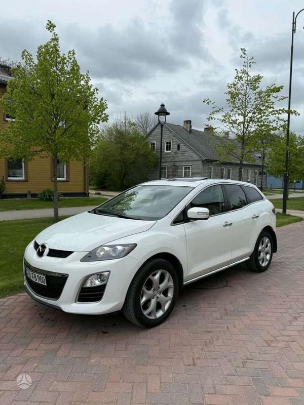 Mazda CX-7 2011 Plungė vietnē Balts Mazda CX-7 2011 Plungė, ar dzinēja tilpumu 2.18 L un nobraukumu 216 tūkst. km par 4800 €, foto 1 vietnē AUTOMOTO.COM.LV