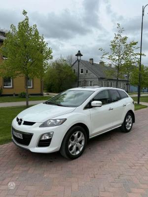 White Mazda CX-7 2011 in Plunge, with an engine capacity of 2.18 L and mileage of 216 thousand km for 4800 €, photo  on AUTOMOTO.COM.LV