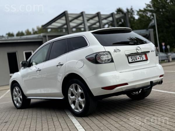 White Mazda CX-7 2011 in Jurmala, with an engine capacity of 2.20 L and mileage of 224 thousand km for 4990 €, photo 4 on AUTOMOTO.COM.LV
