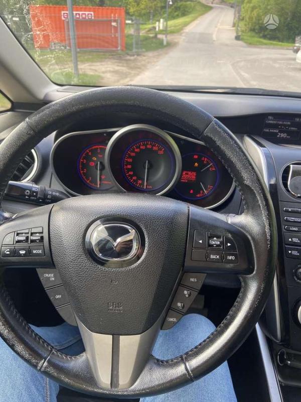 White Mazda CX-7 2012 in Alytus, with an engine capacity of 2.18 L and mileage of 210 thousand km for 4200 €, photo 7 on AUTOMOTO.COM.LV