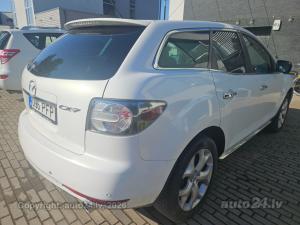 White Mazda CX-7 2012 in Tartu, with an engine capacity of 2.20 L and mileage of 223 thousand km for 4950 €, photo 4 on AUTOMOTO.COM.LV