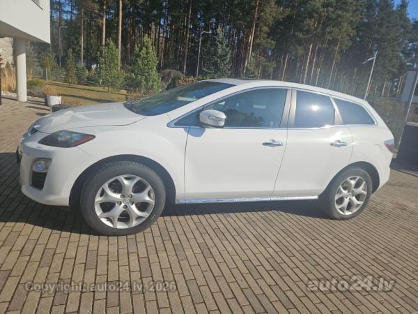 White Mazda CX-7 2012 in Tartu, with an engine capacity of 2.20 L and mileage of 223 thousand km for 4950 €, photo 6 on AUTOMOTO.COM.LV