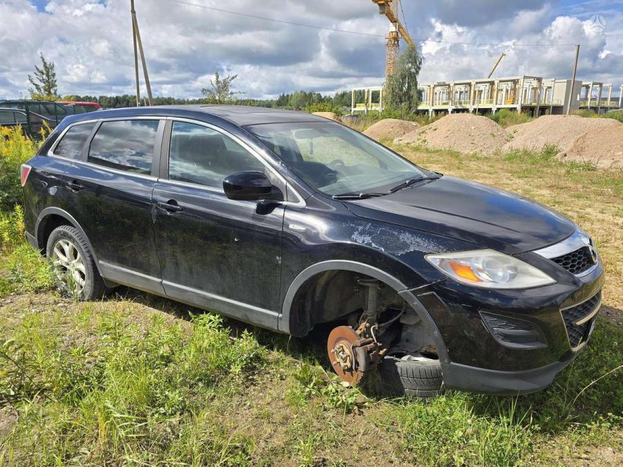 Black Mazda CX-9 2011 in Vilnius, with an engine capacity of 3.70 L and mileage of 97 thousand km for 1950 €, photo 3 on AUTOMOTO.COM.LV