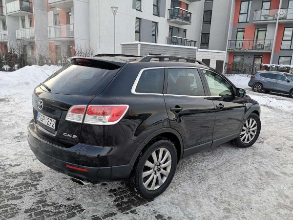 Black Mazda CX-9 2008 in Klaipeda, with an engine capacity of 3.50 L and mileage of 94 thousand km for 2999 €, photo 4 on AUTOMOTO.COM.LV