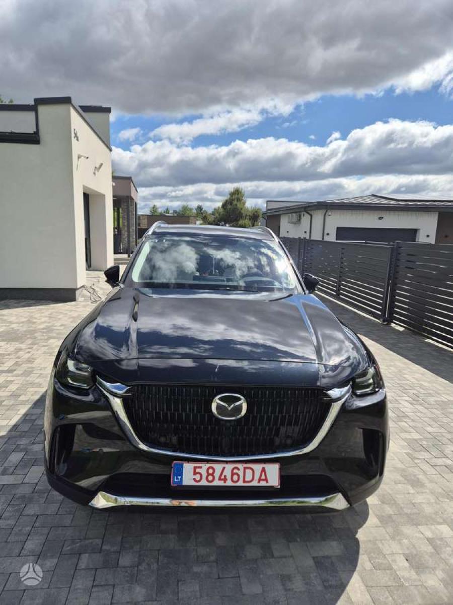 Black Mazda CX-90 2024 in Vilnius, with an engine capacity of 2.49 L and mileage of 20 thousand km for 46000 €, photo 1 on AUTOMOTO.COM.LV