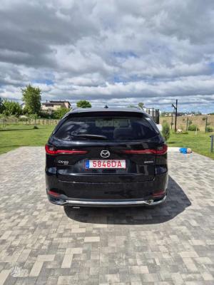 Black Mazda CX-90 2024 in Vilnius, with an engine capacity of 2.49 L and mileage of 20 thousand km for 46000 €, photo 5 on AUTOMOTO.COM.LV